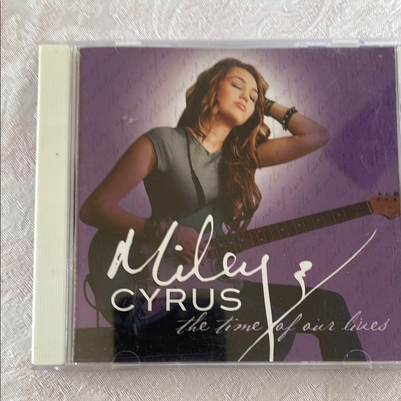 Other | Miley Cyrus Music Cd With Purple Cover | Poshmark
